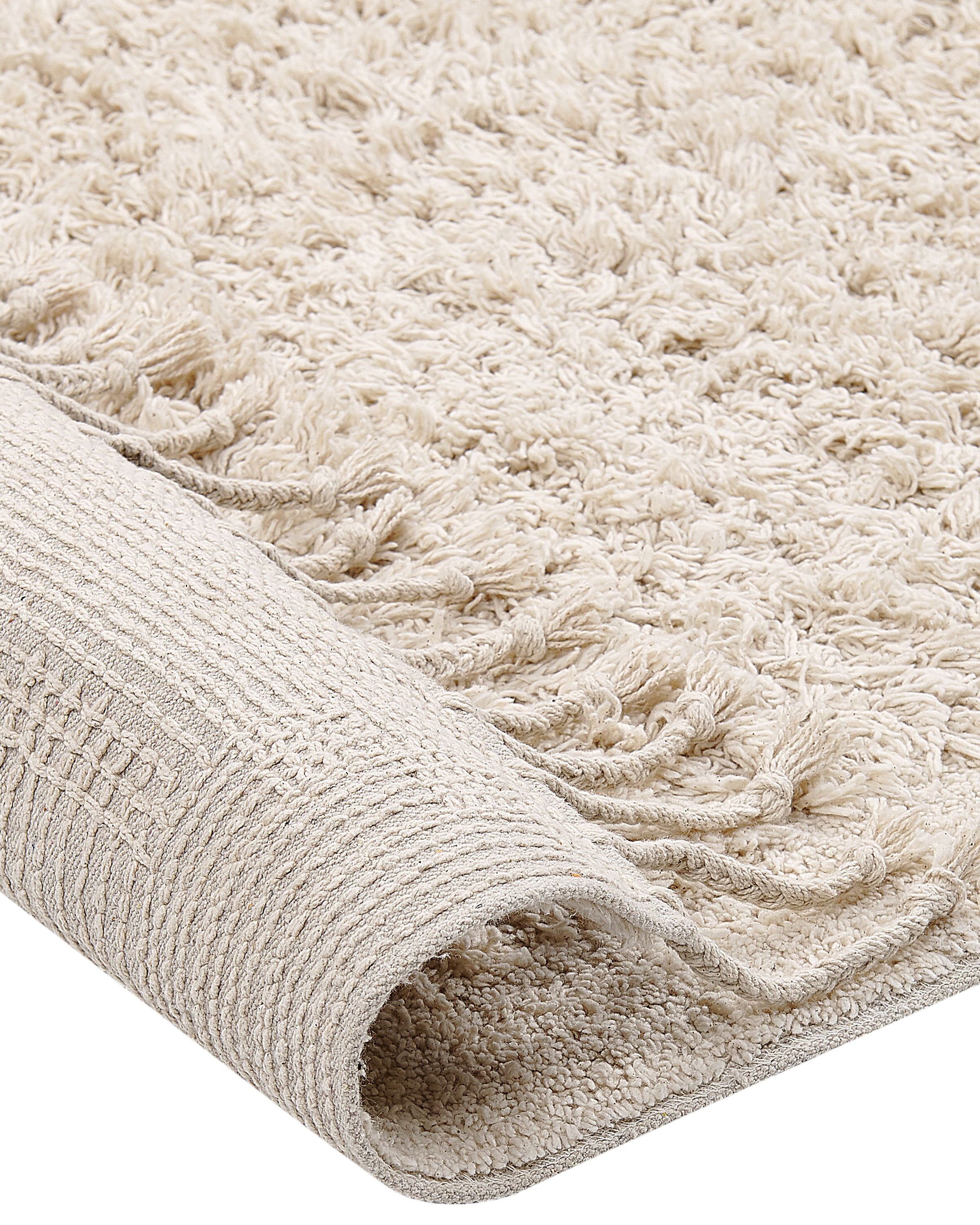 Teppich Baumwolle hellbeige 80 x 150 cm Fransen Shaggy BITLIS | Beliani.at
