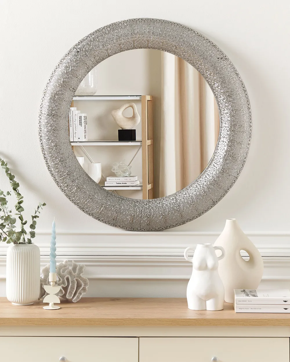 large silver round mirror