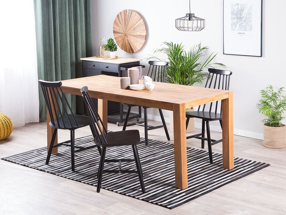 Light wood dining table with black chairs store
