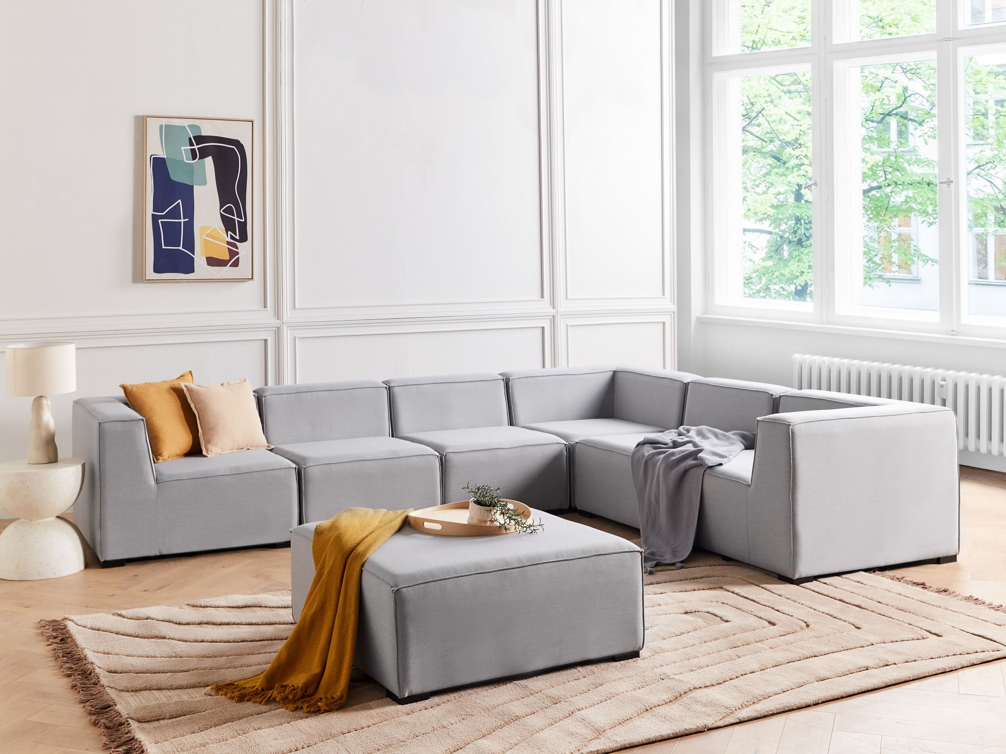 Sofá esquinero de jardín con otomana 7 plazas AREZZO Izquierda modular Gris claro | Beliani.es