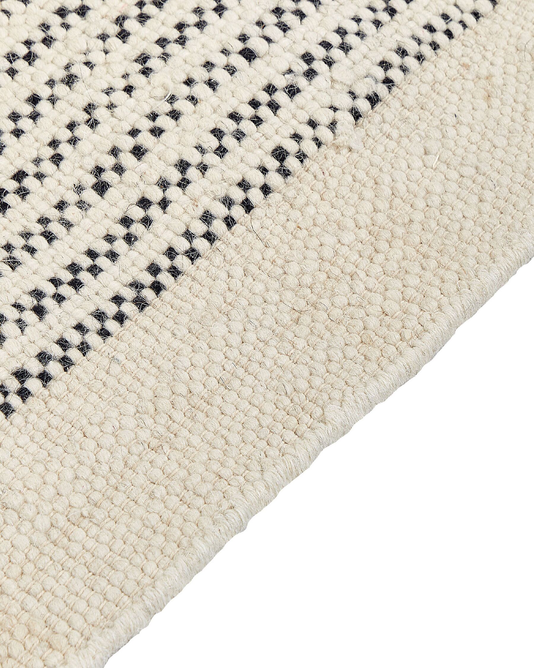 Ullteppe 140 x 200 cm beige og svart DIVARLI | Beliani.no