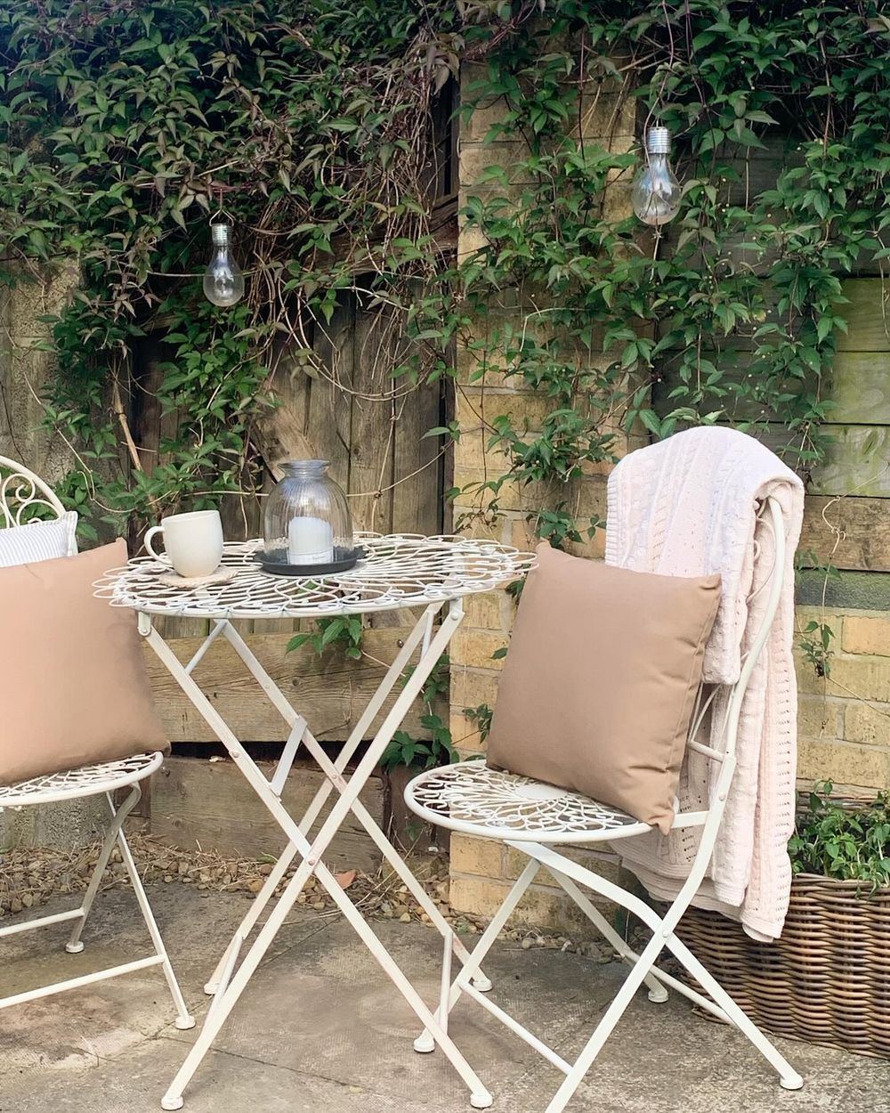 Cream metal garden table and chairs store